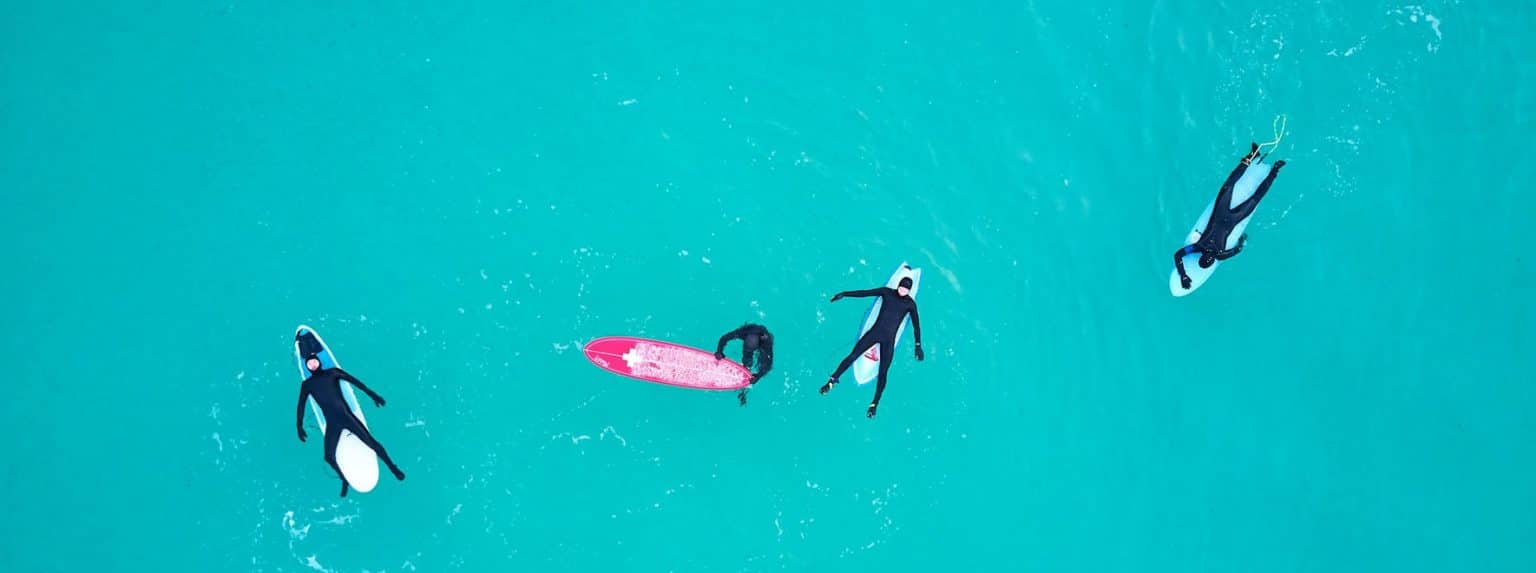 How to Surf: Best First Time Surfing Guide (Beginners)